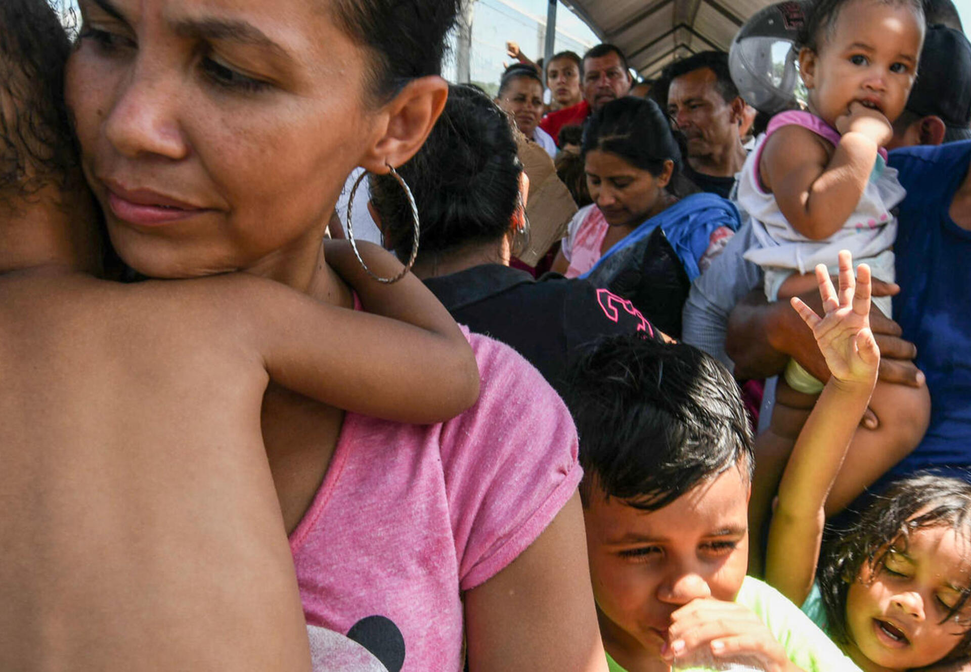 What is causing the growing humanitarian crisis along the U.S.-Mexico ...
