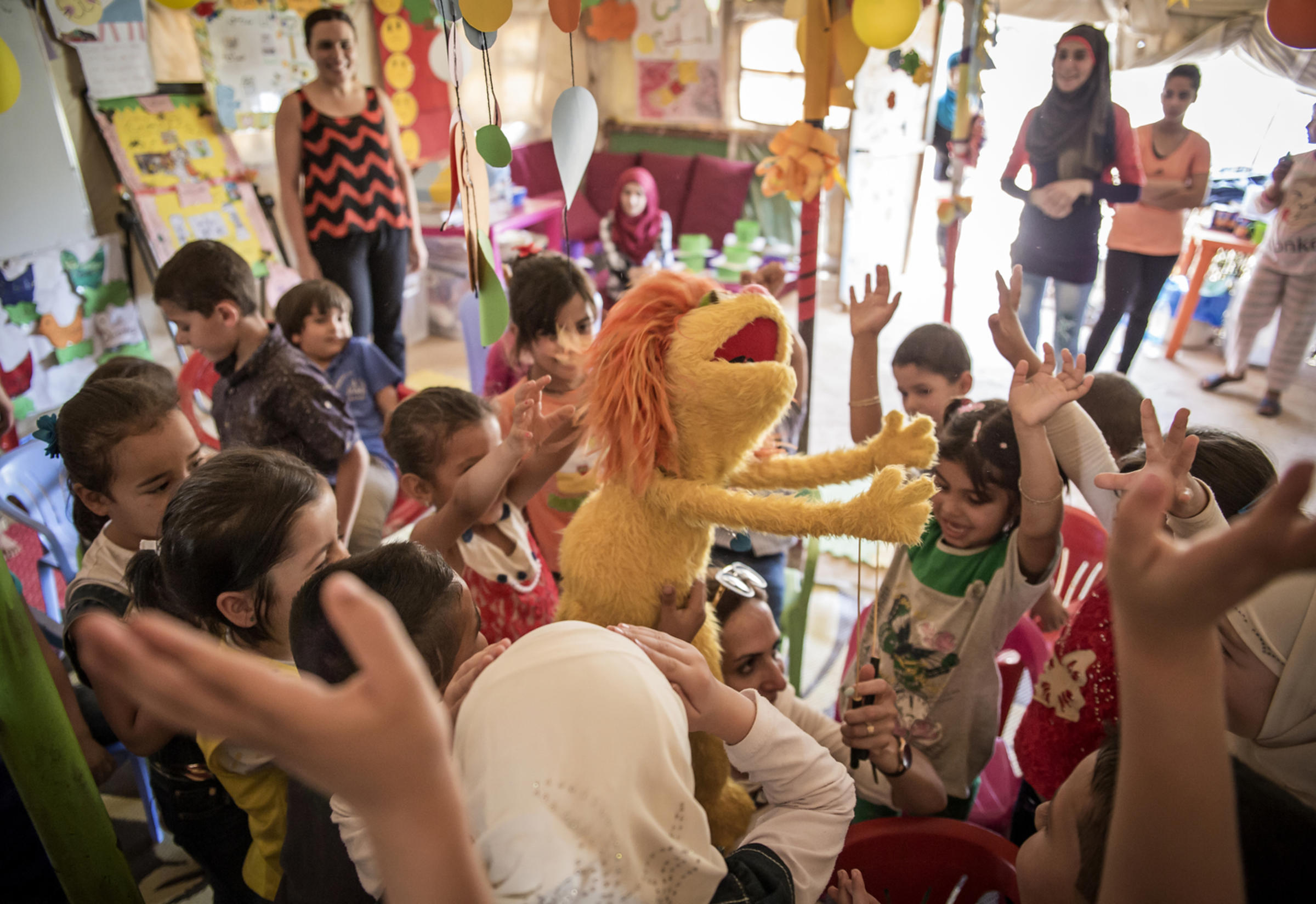 Syrian children make a new friend: a Sesame Street Muppet ...
