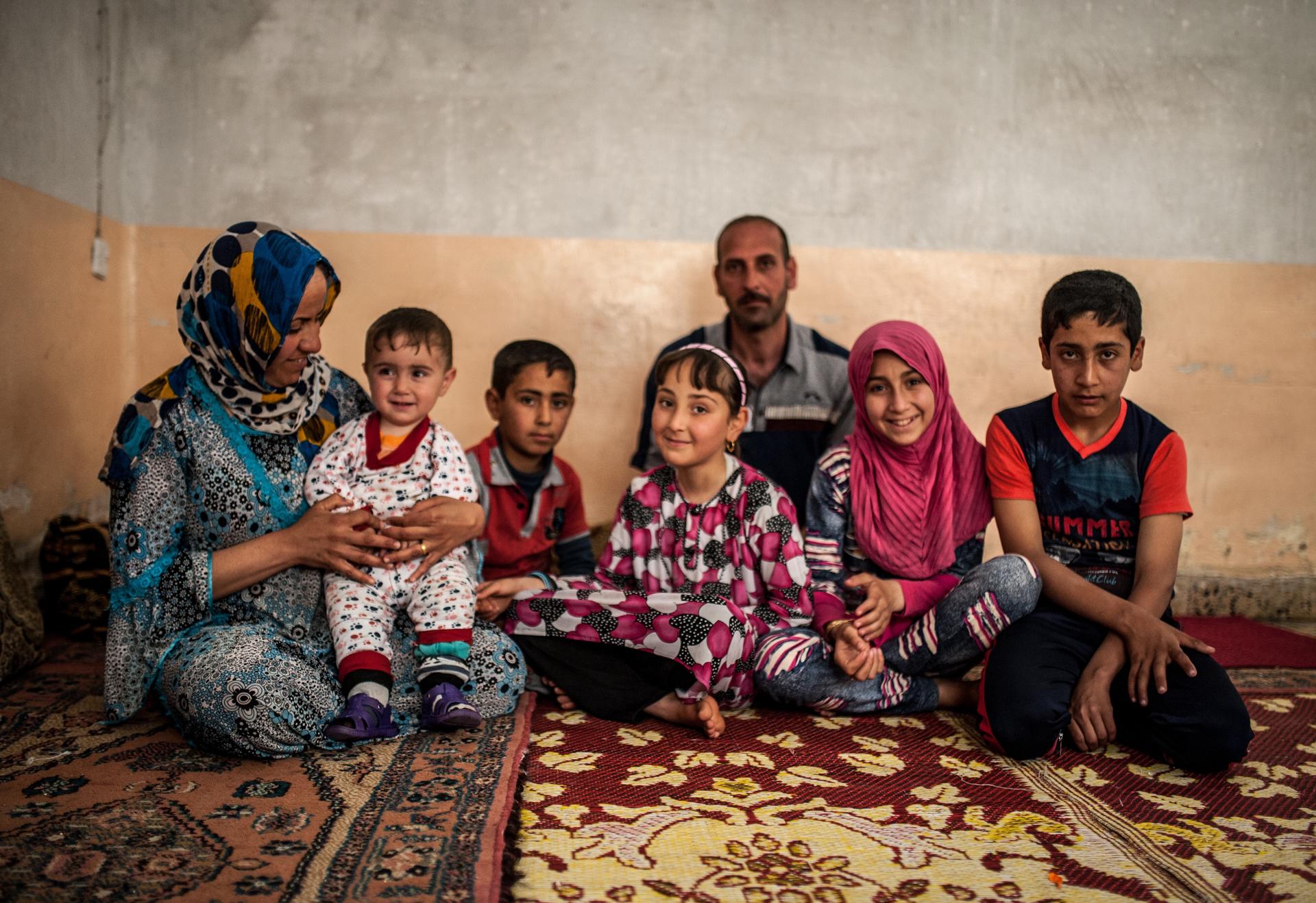 Cash relief helps an Iraqi family start over after ISIS | International ...
