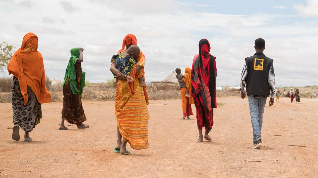 What two Ethiopian mothers are feeding their children in the face of ...