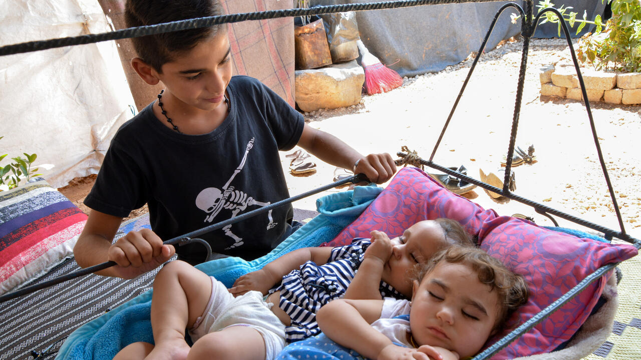 After fleeing his home, a Syrian boy finds joy in music and art | The IRC