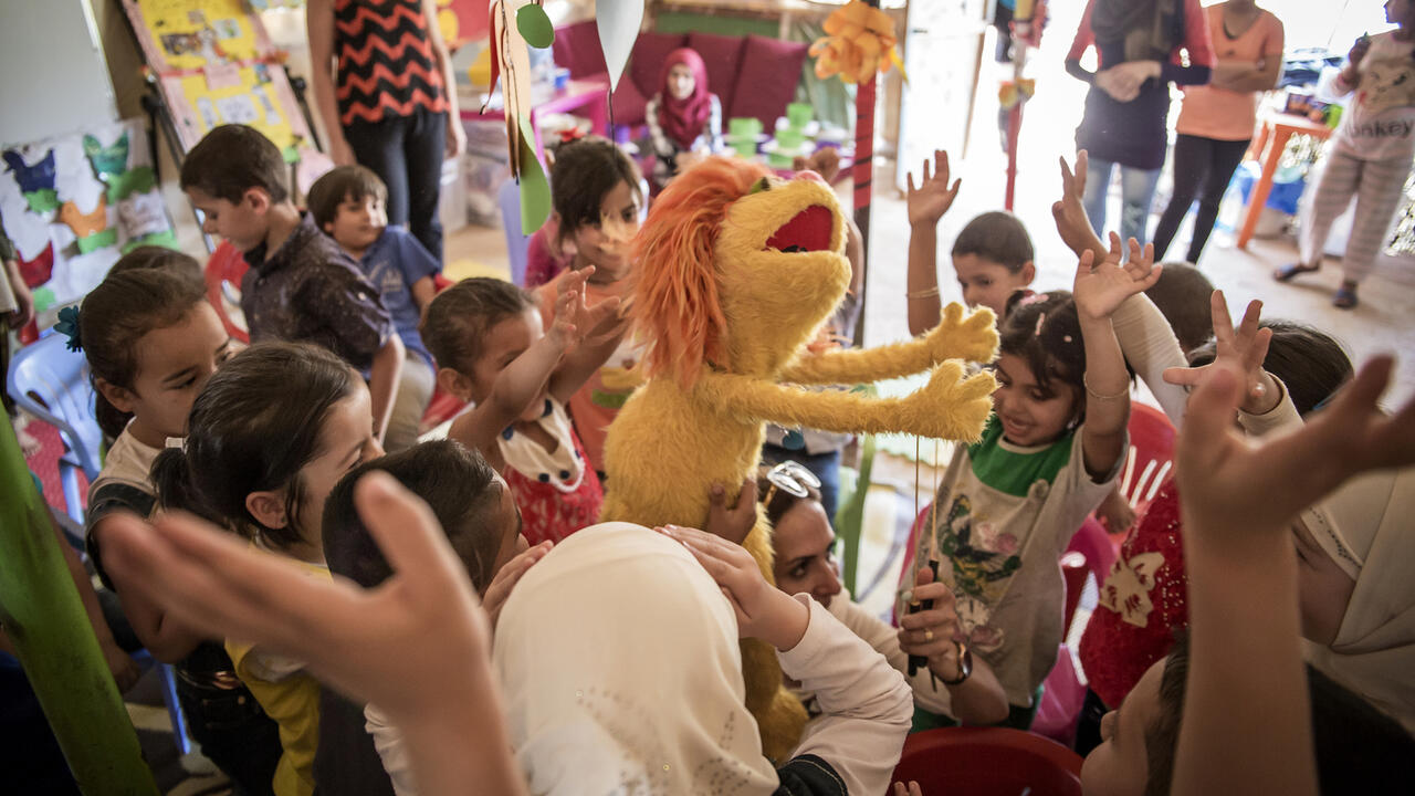 Syrian children make a new friend: a Sesame Street Muppet ...